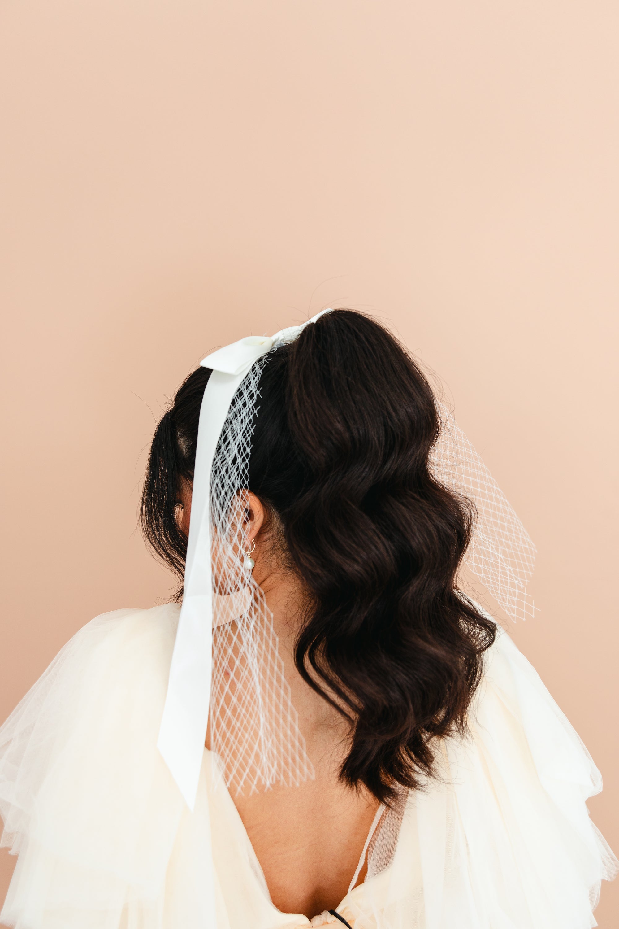 Neva Bow – Jay Kay Braids and Bridal