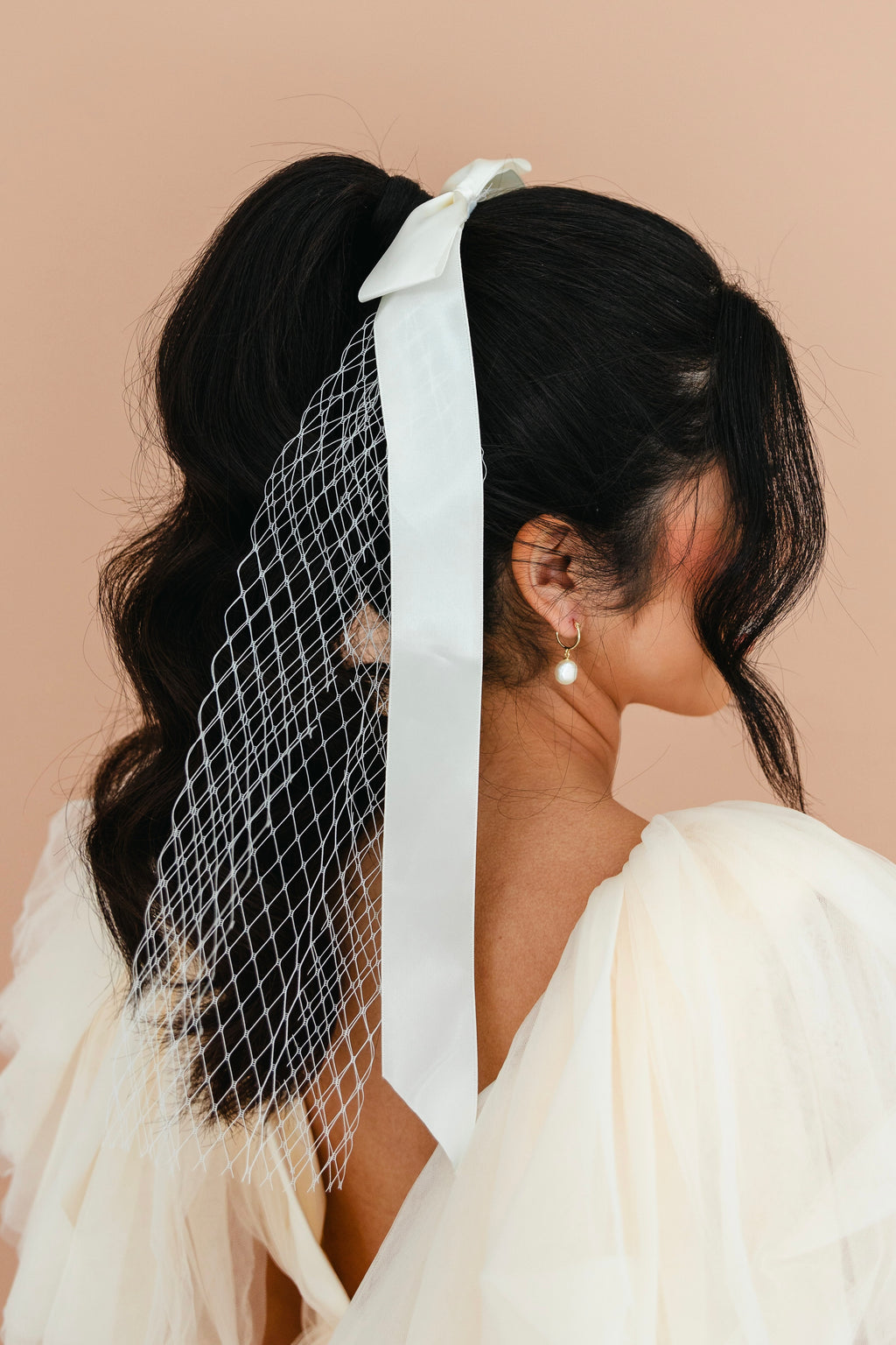Neva Bow – Jay Kay Braids and Bridal